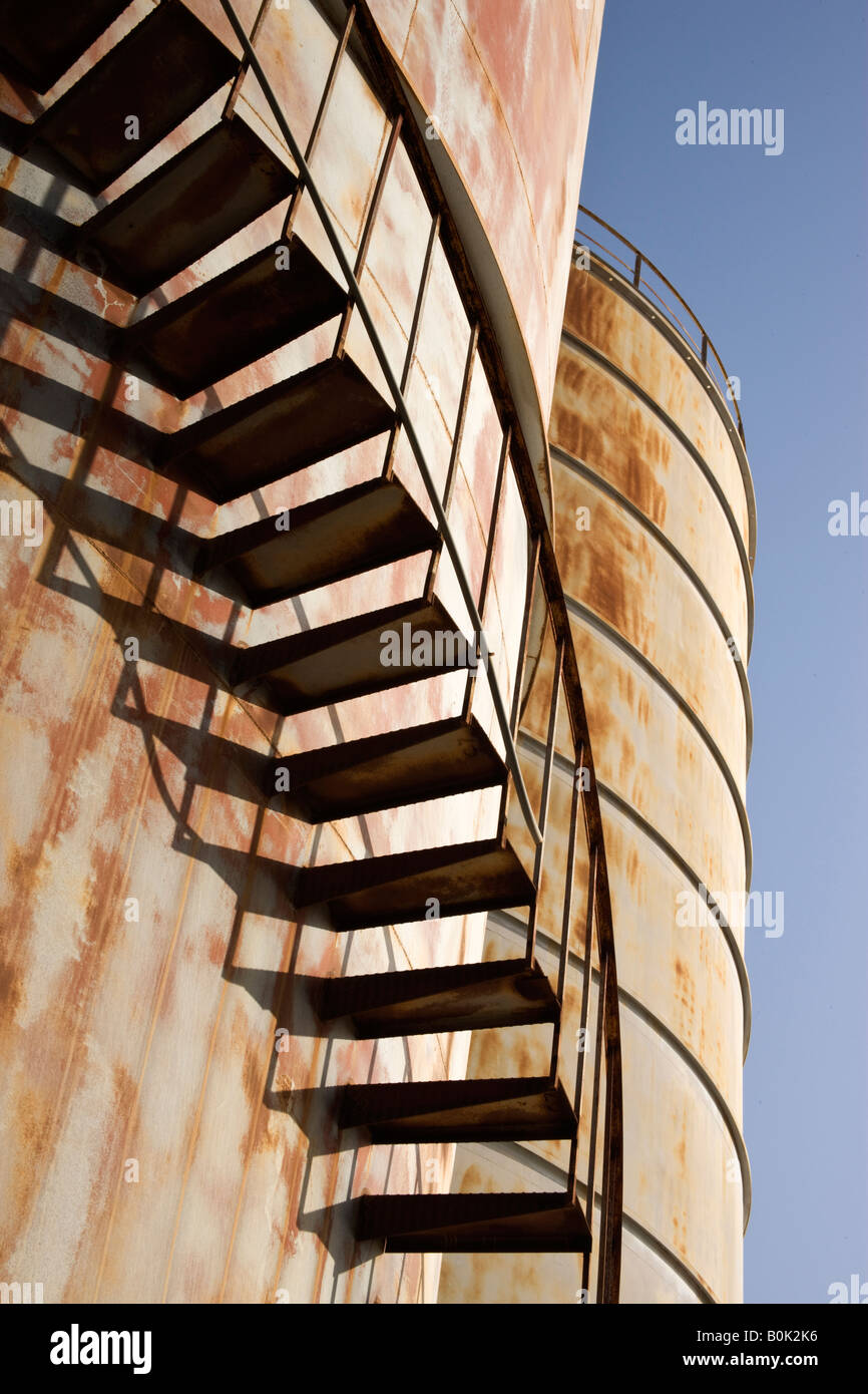 Rusty spiral metal stairs leading upward Stock Photo - Alamy