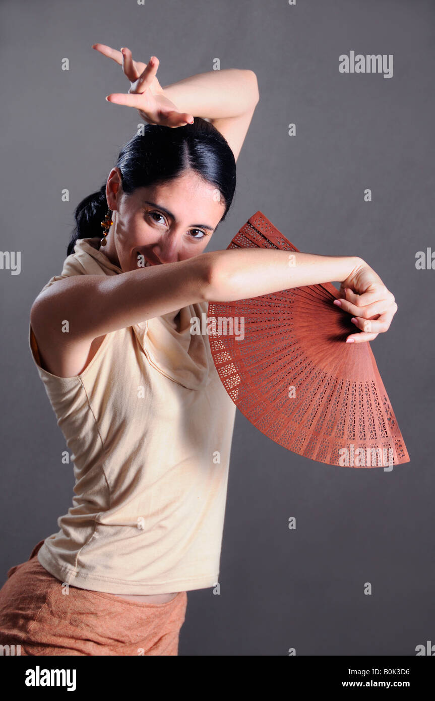 Portrait of hispanic flamenco dancer woman with traditional fan Stock ...
