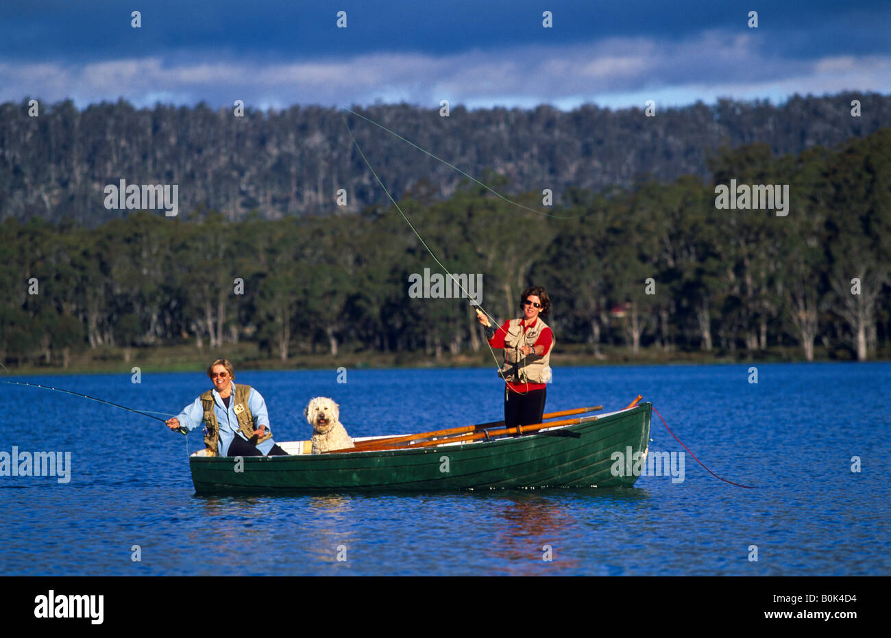 Fly fishing from wooden dinghy Highland Waters Central Highlands ...