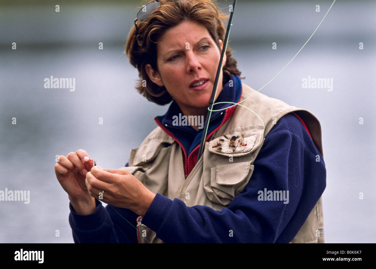 Woman tying flies hi-res stock photography and images - Alamy