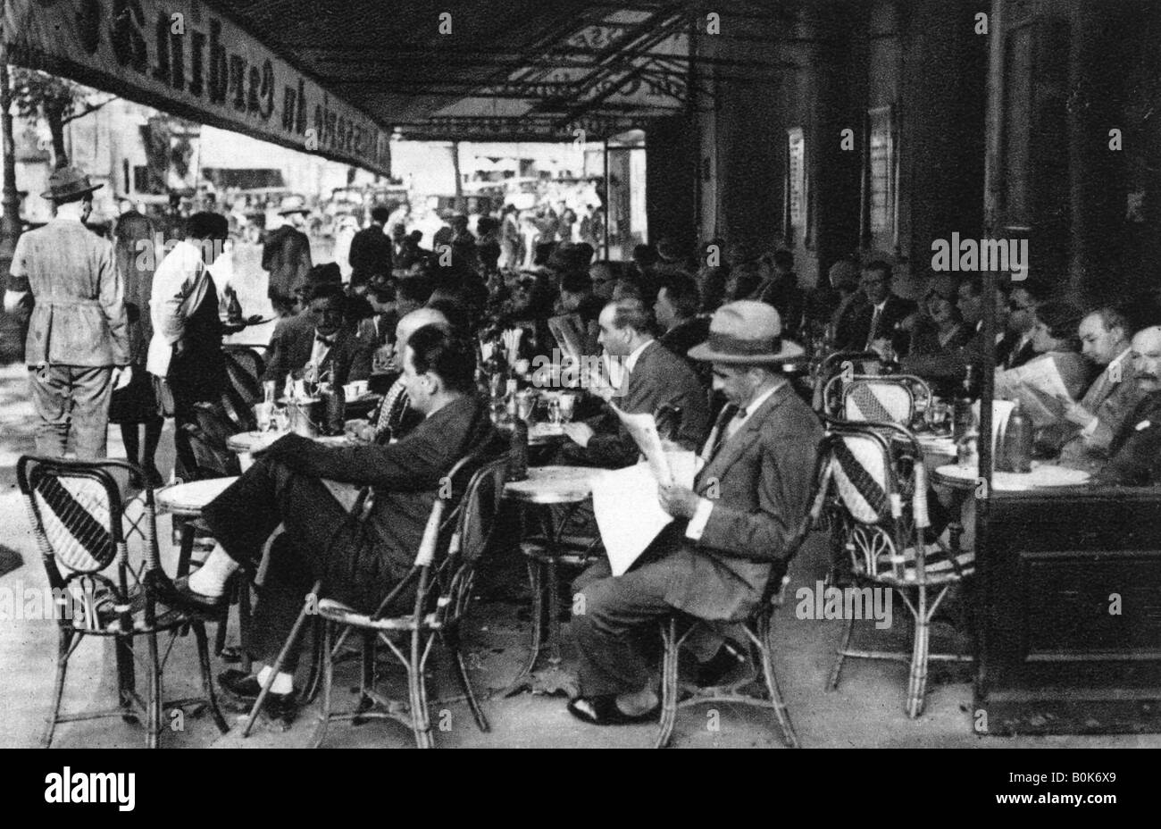 People at a pavement cafe, Paris, 1931.Artist: Ernest Flammarion Stock ...