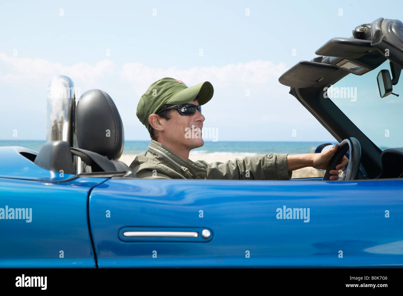 Mid-Adult Man Driving Car Stock Photo - Alamy