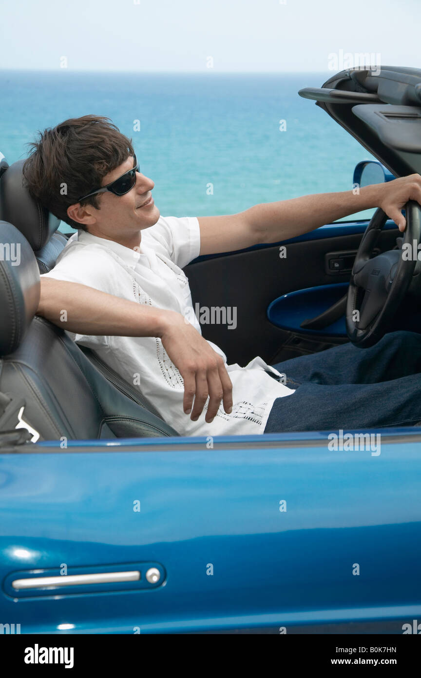 Mid-Adult Man Driving Convertible Stock Photo - Alamy