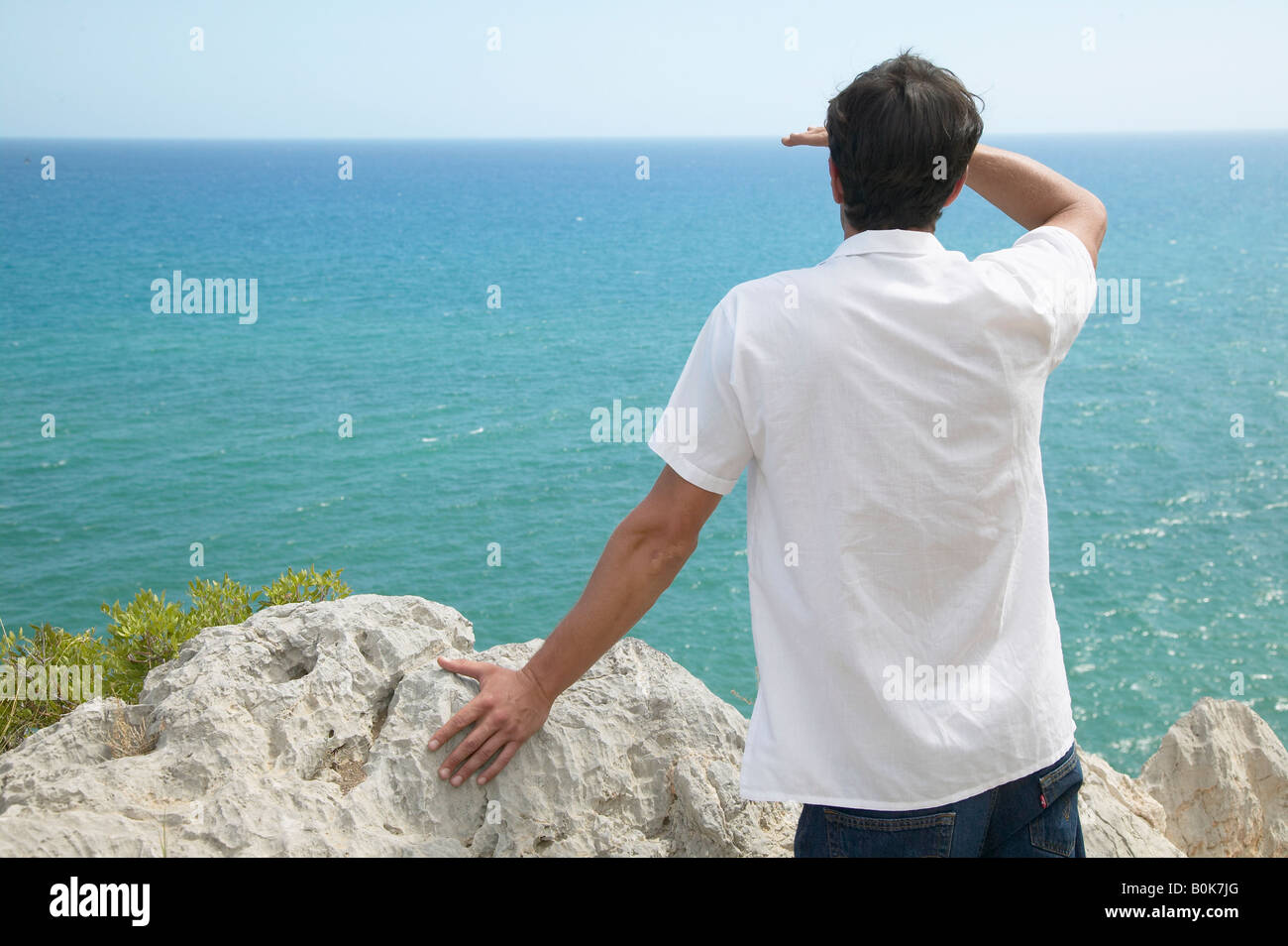 Mid-Adult Man Looking at Sea Stock Photo - Alamy