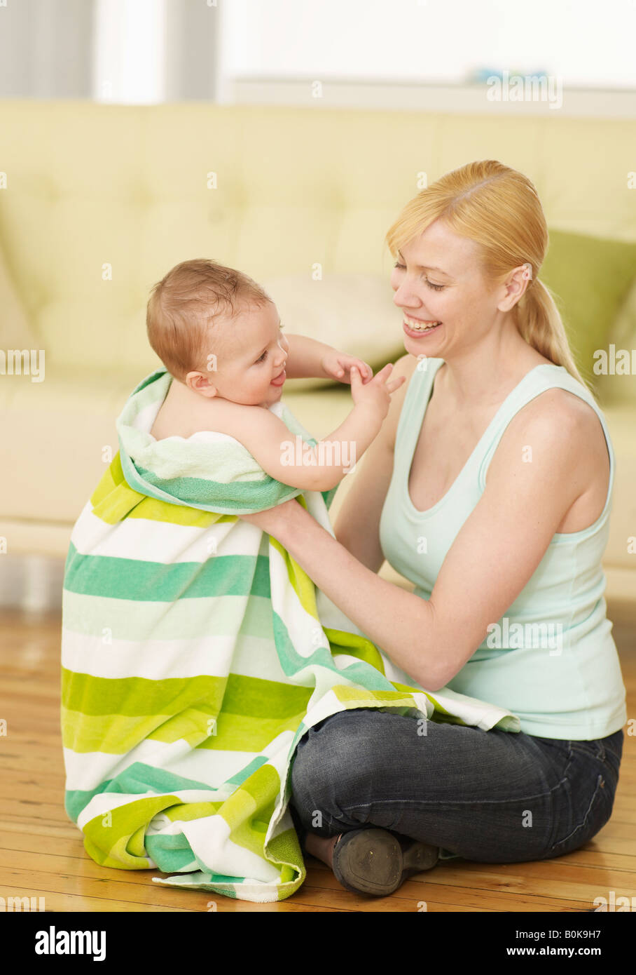 Mother Drying Baby Boy with Towel Stock Photo - Alamy