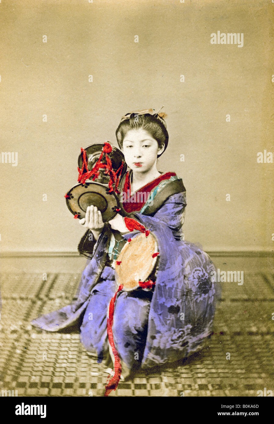 Geisha playing the tsuzumi, Japan, 1882. Artist: Felice Beato Stock ...