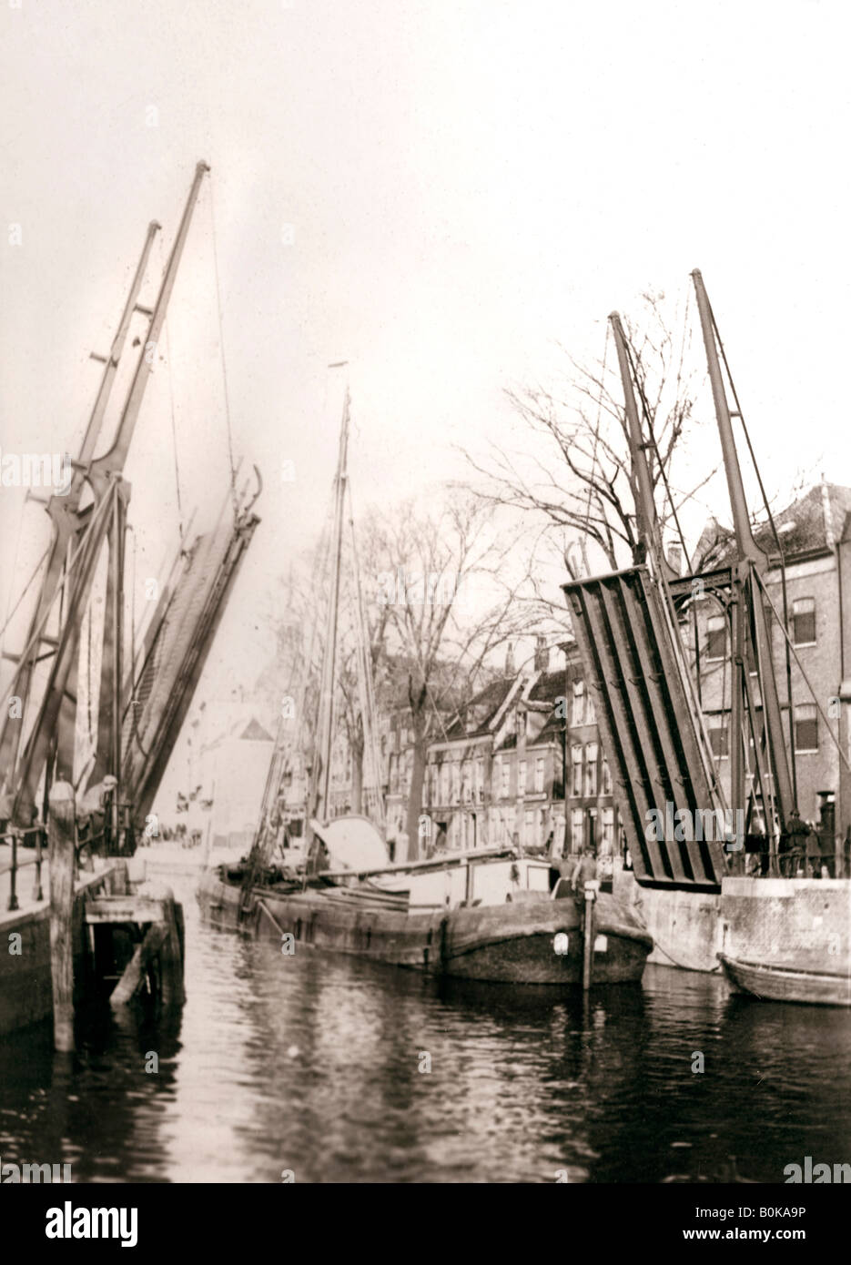 Canal bridge and boats, Dordrecht, Netherlands, 1898.Artist: James ...