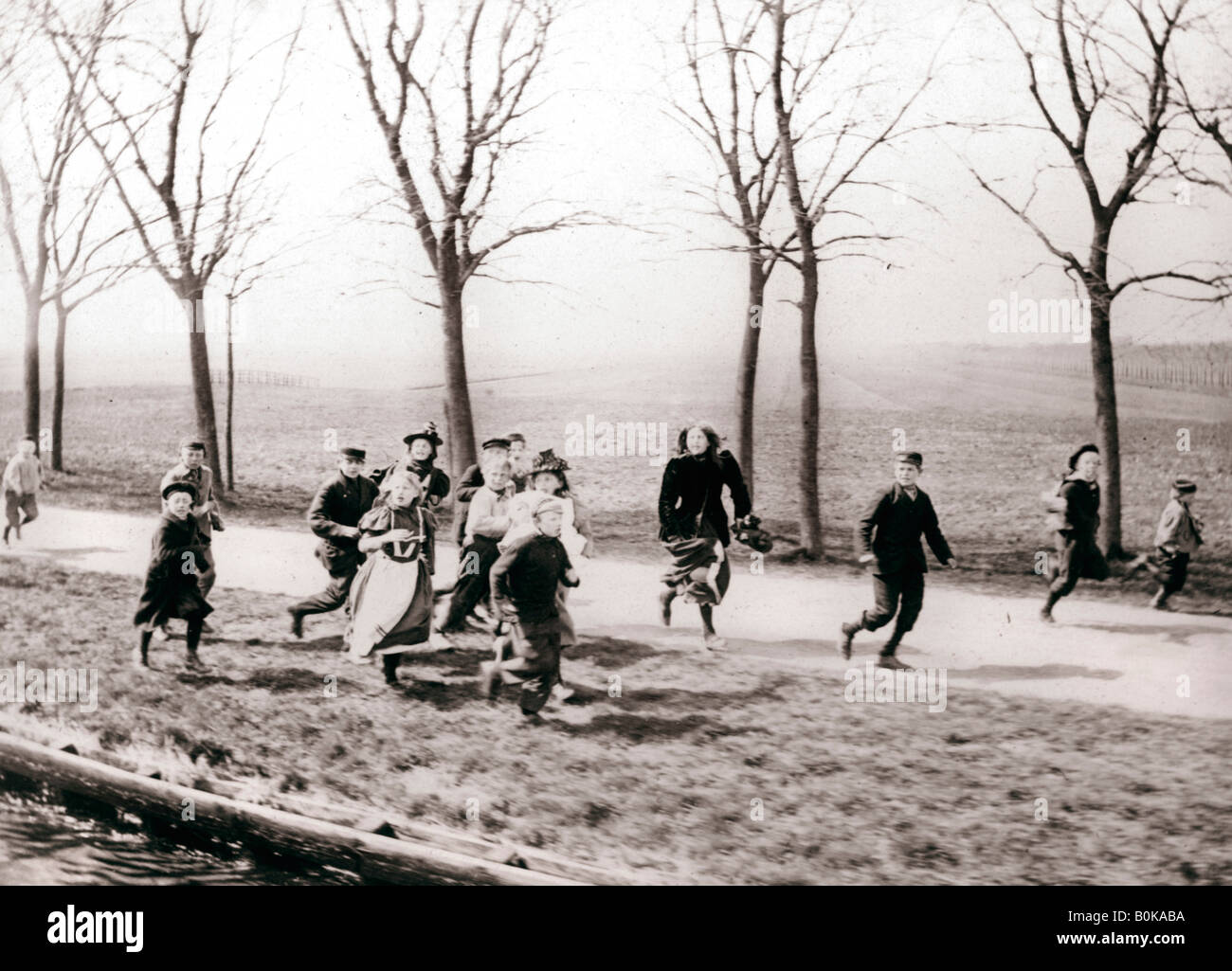 Children running alongside a canal, Monnickendam, Netherlands, 1898 ...