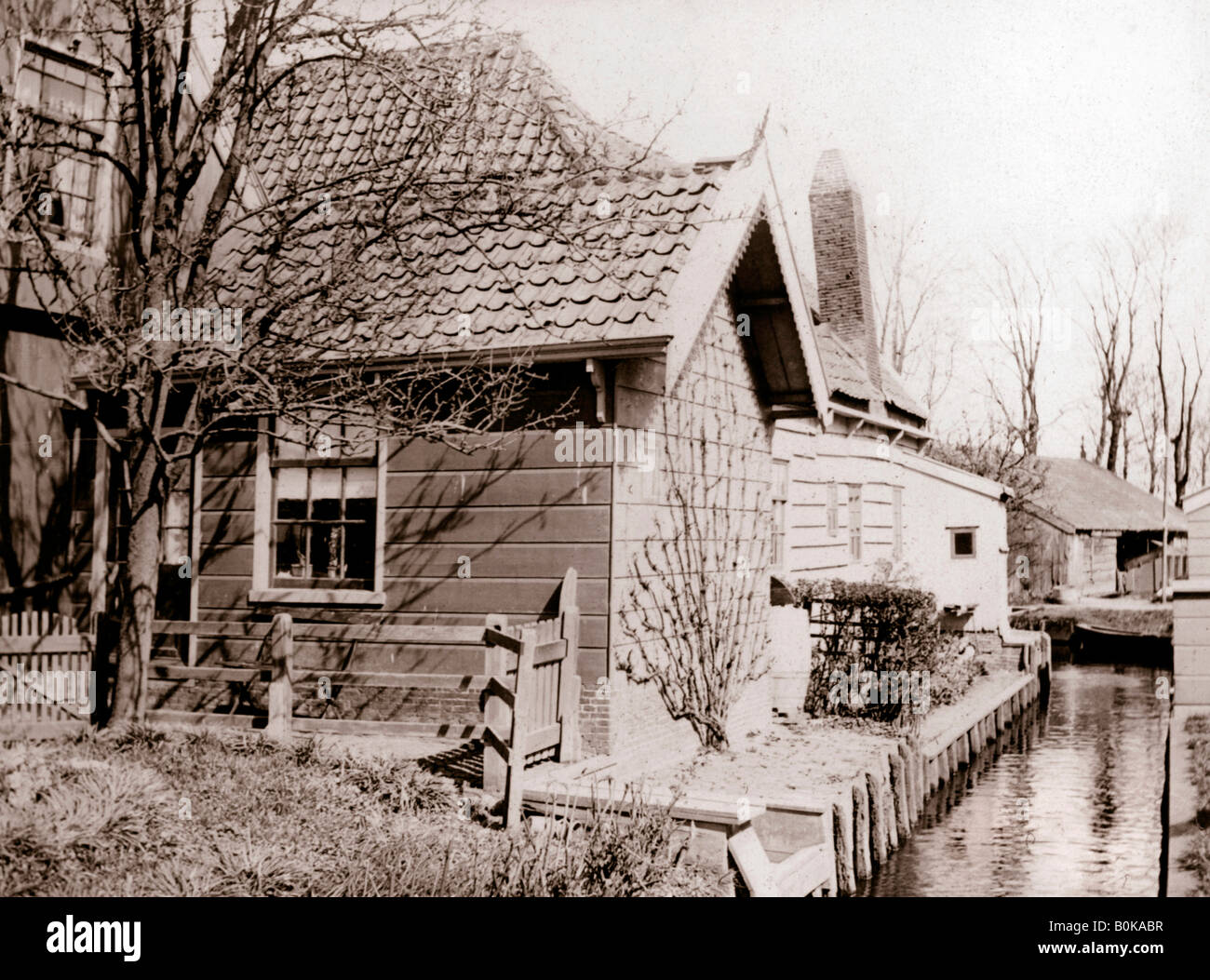 House on a canal bank, Broek, Netherlands, 1898.Artist: James Batkin ...