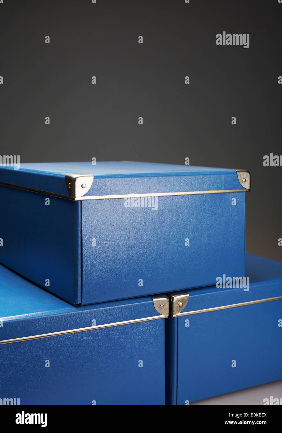 Three Blue Cardboard Boxes Stock Photo - Alamy