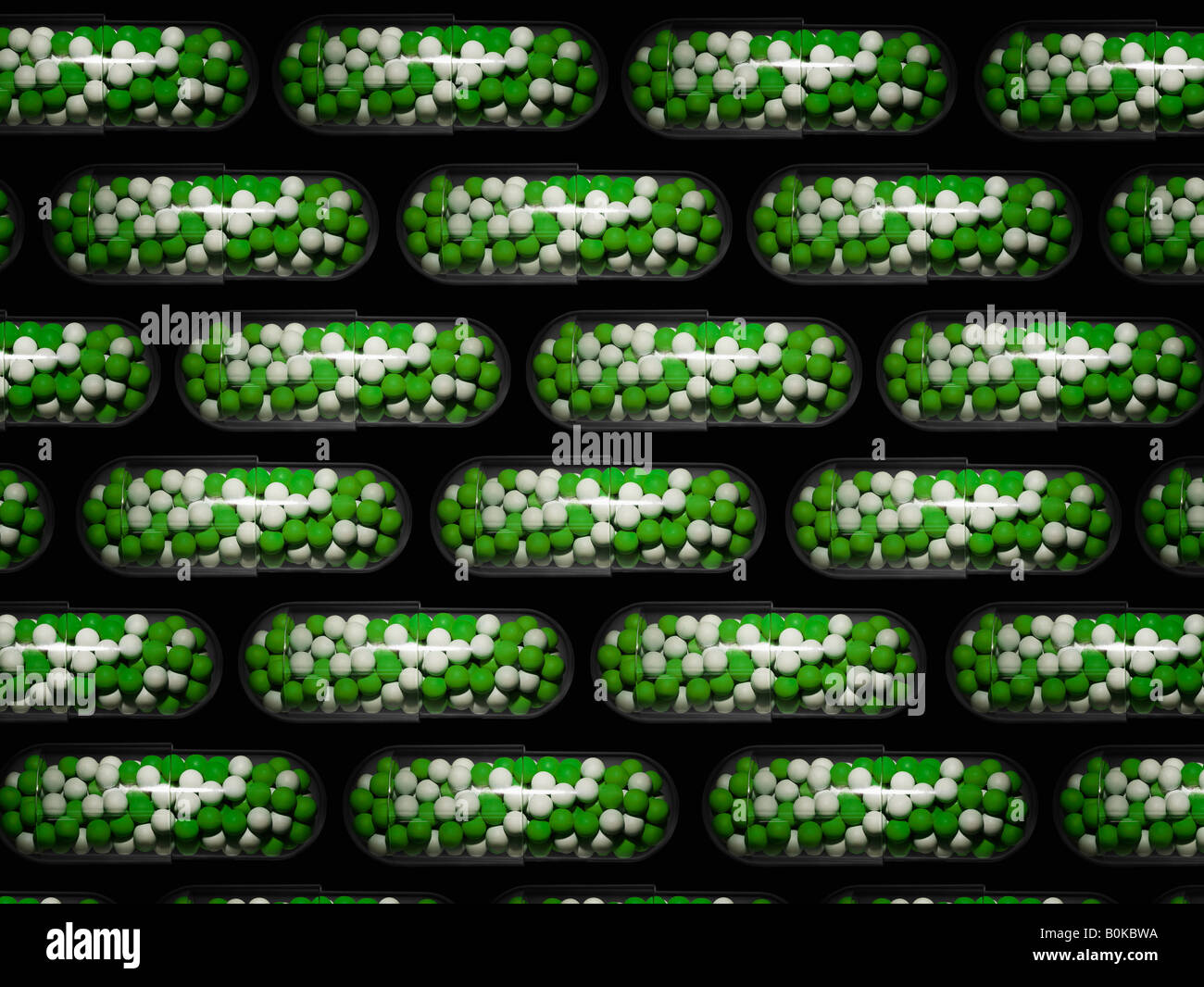 Green and White Capsules Stock Photo - Alamy