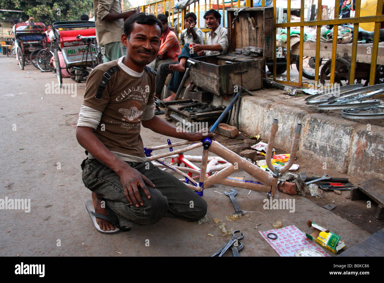 A workshop for repairing bicycles in the Old Town in Delhi India Stock ...