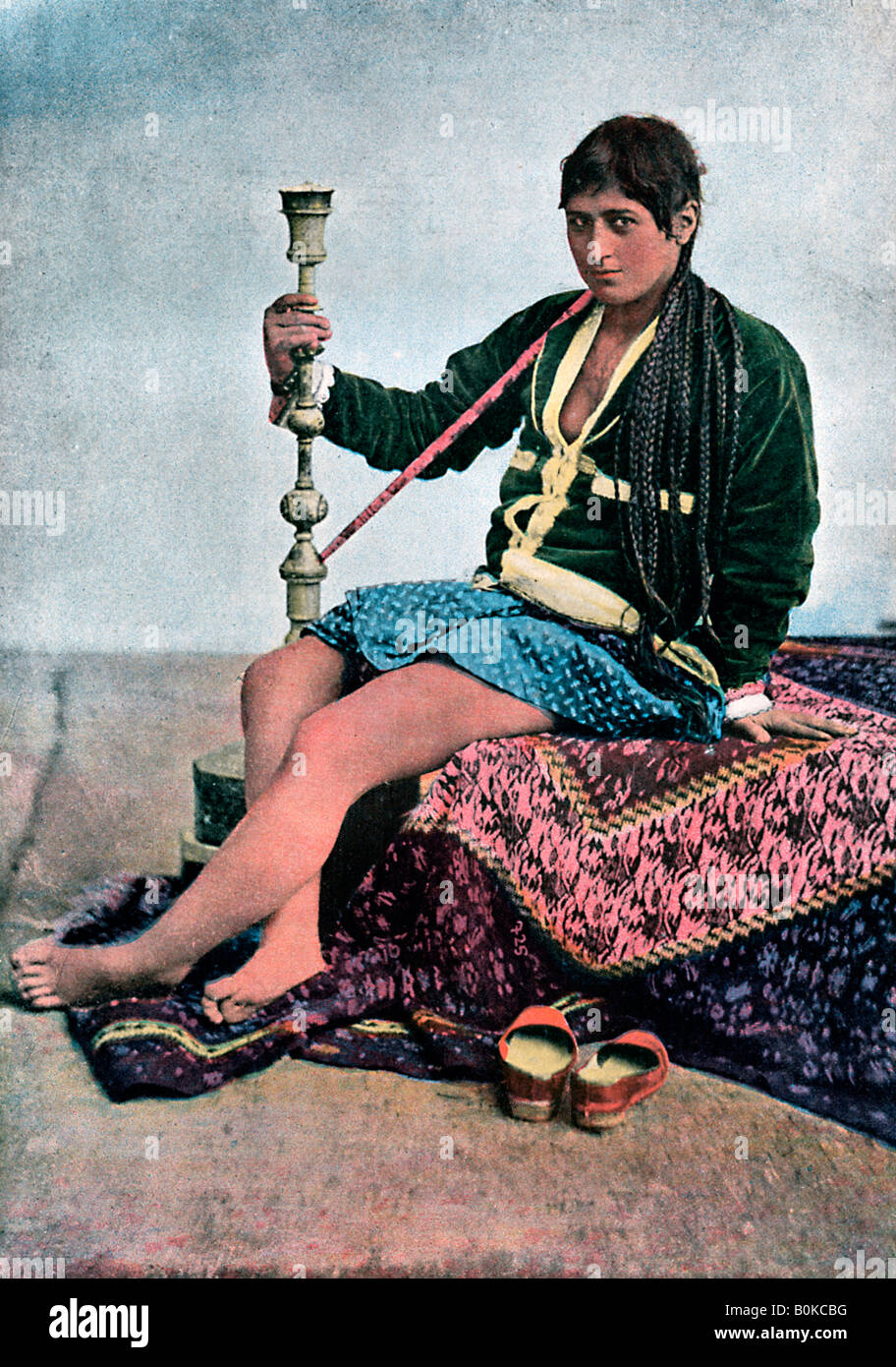 Persian woman smoking in Kalgan, c1890. Artist: Unknown Stock Photo - Alamy