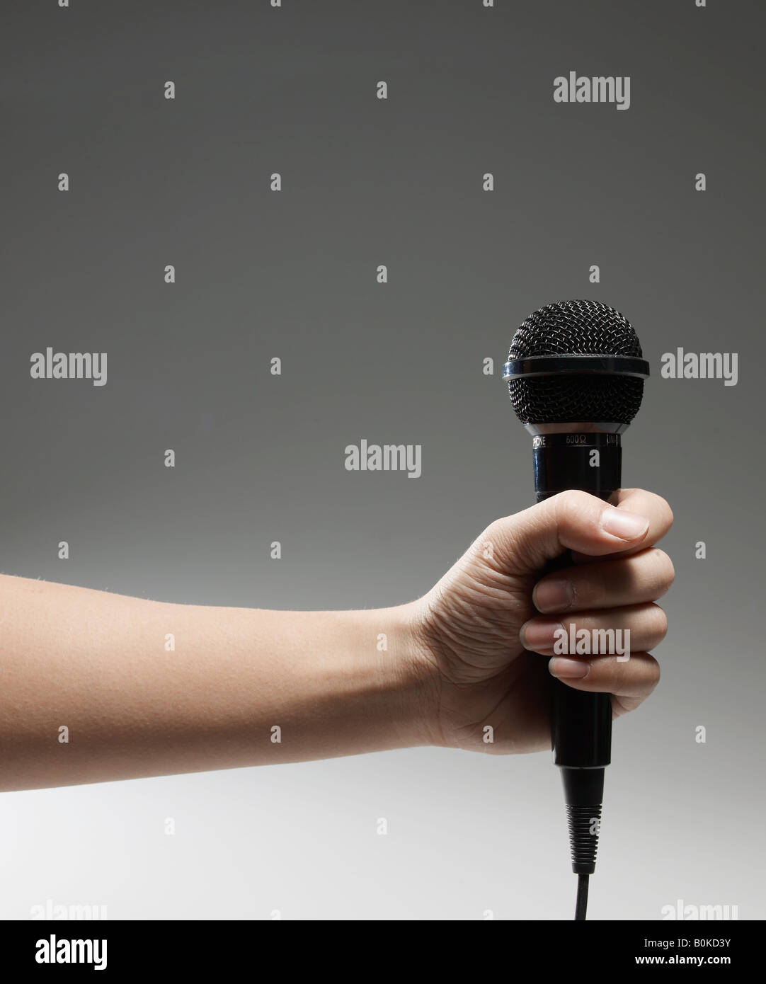 Man Holding Microphone Stock Photo - Alamy