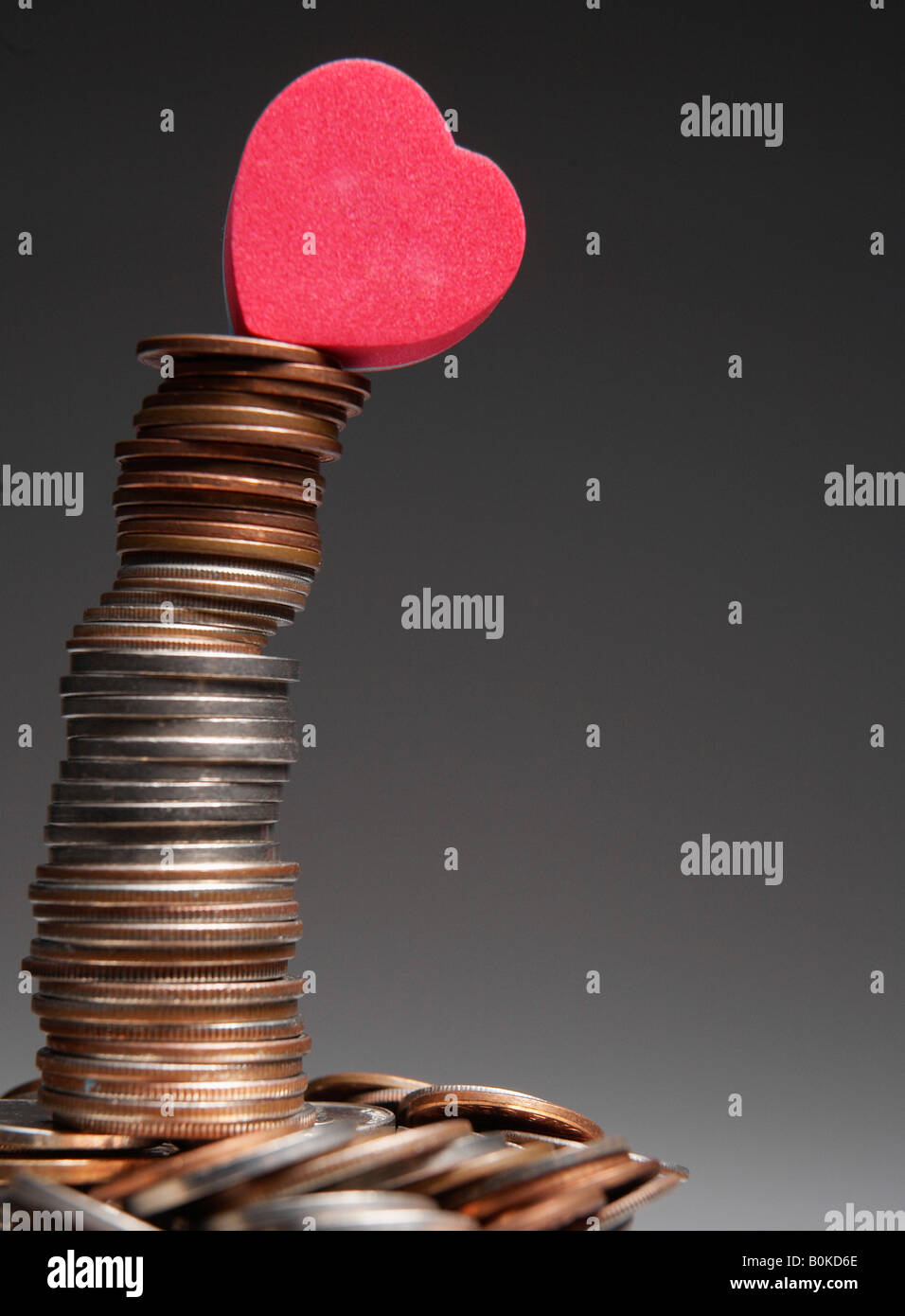 Heart of coins hi-res stock photography and images - Alamy