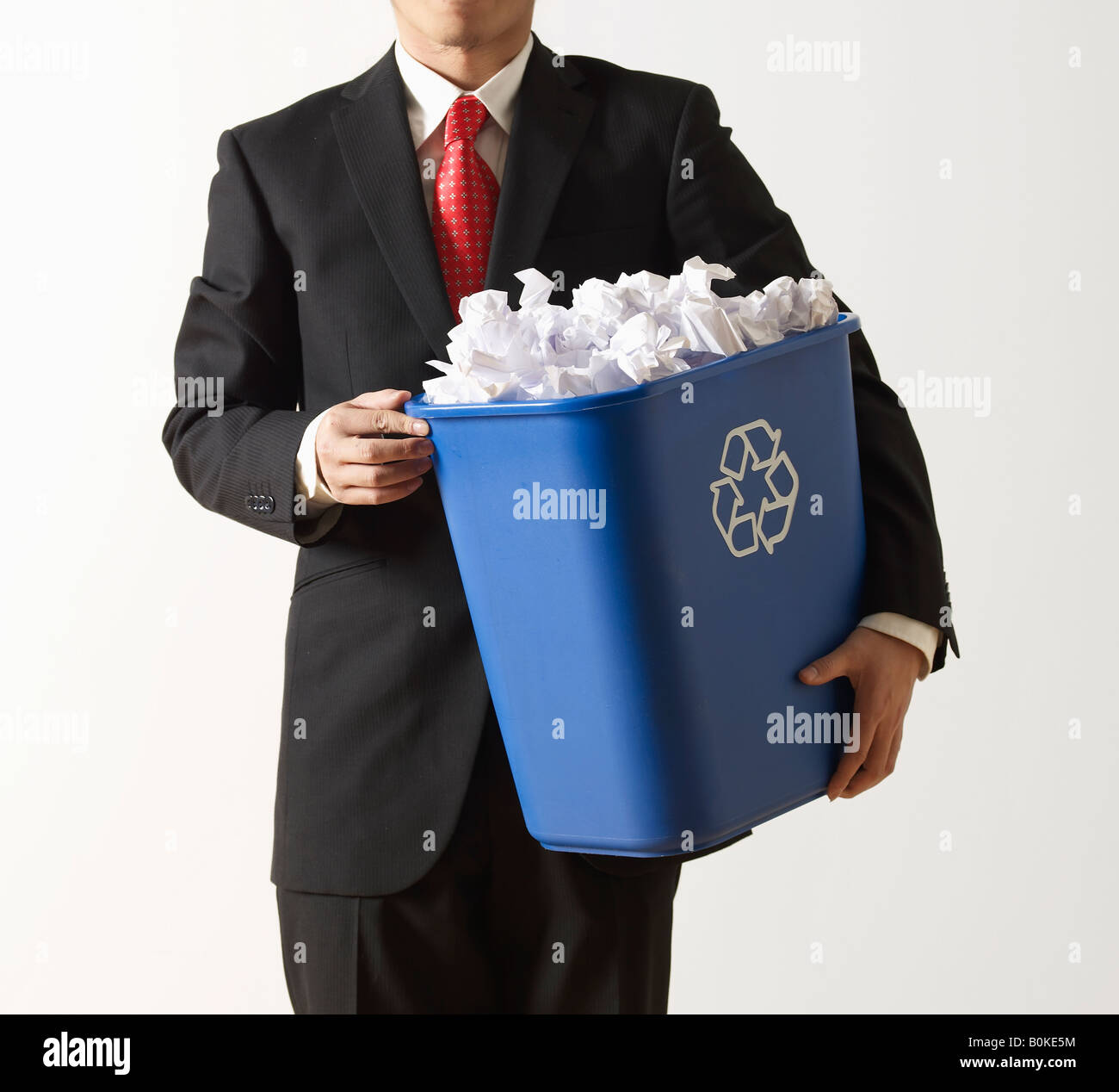 Businessman Holding Recycling Paper Bin Stock Photo - Alamy