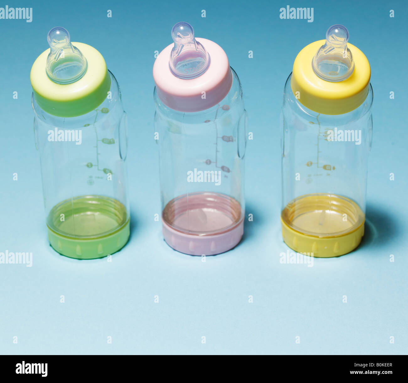 Three Baby Bottles Stock Photo - Alamy