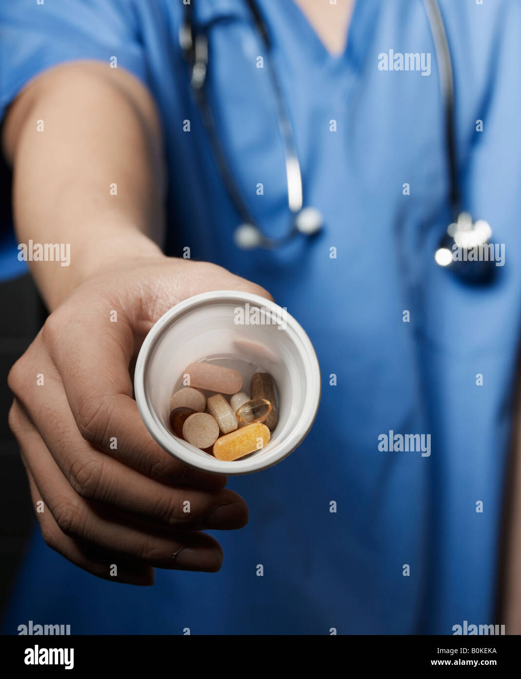 Doctor Showing Pills Stock Photo - Alamy