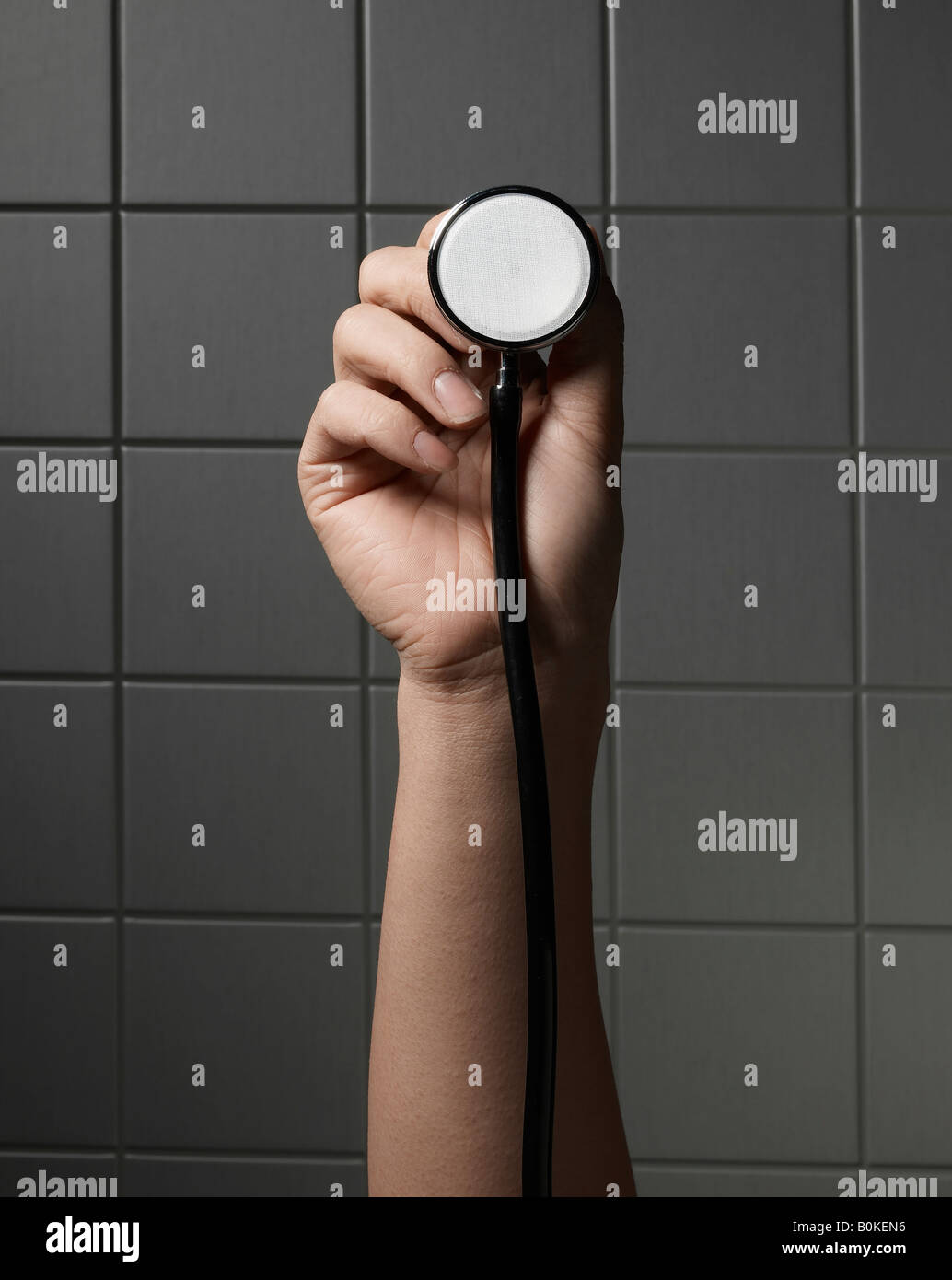 Person's Hand Holding Stethoscope Stock Photo - Alamy