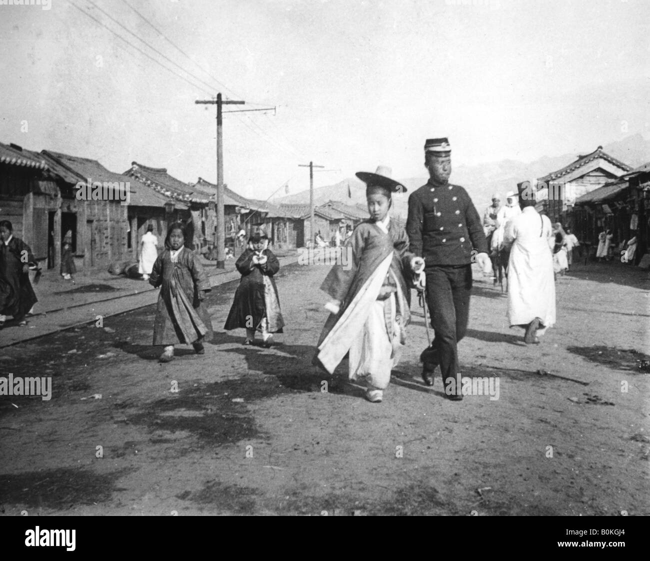 Street scene man hat Black and White Stock Photos & Images - Alamy