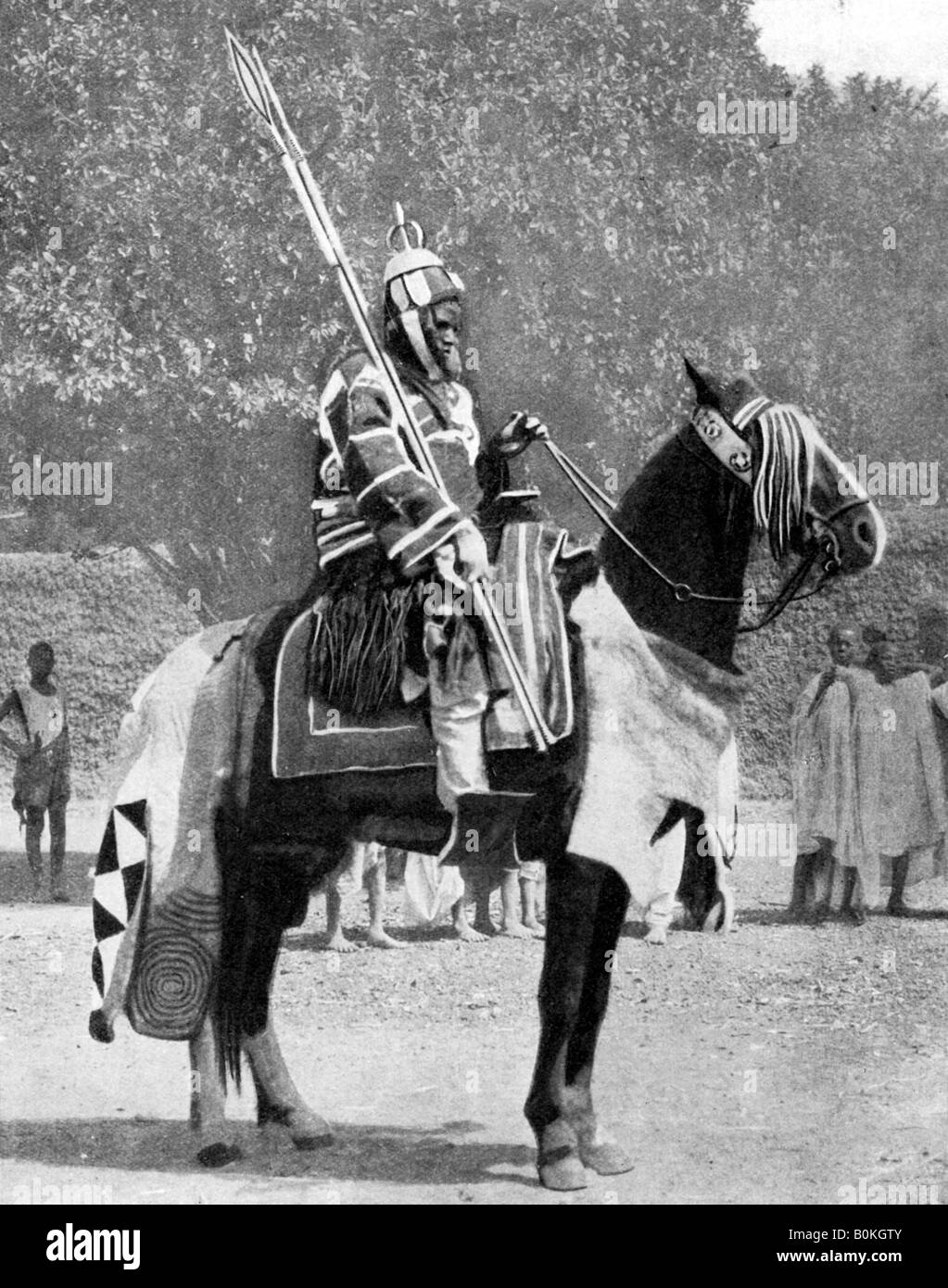 Royal bodyguard in ancient armour, northern Nigeria, 1936.Artist: Wide ...