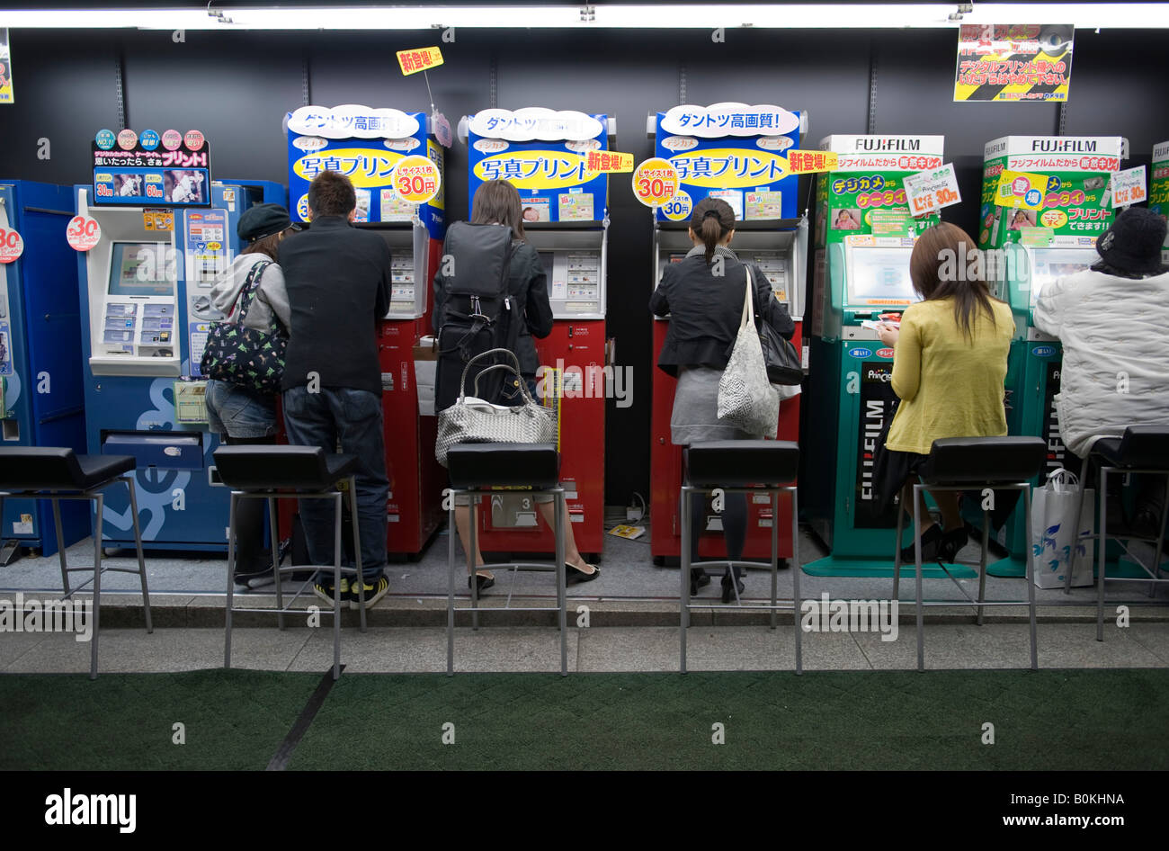 Row of booths hi-res stock photography and images - Alamy