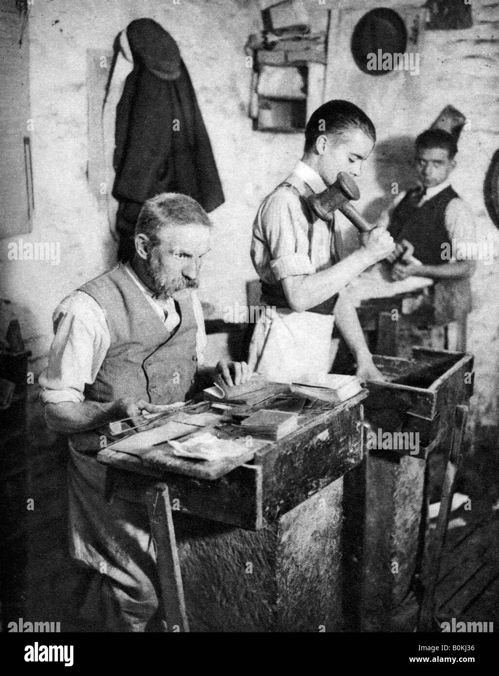 Gold-beating in a London workshop, 1926-1927. Artist: Unknown Stock ...
