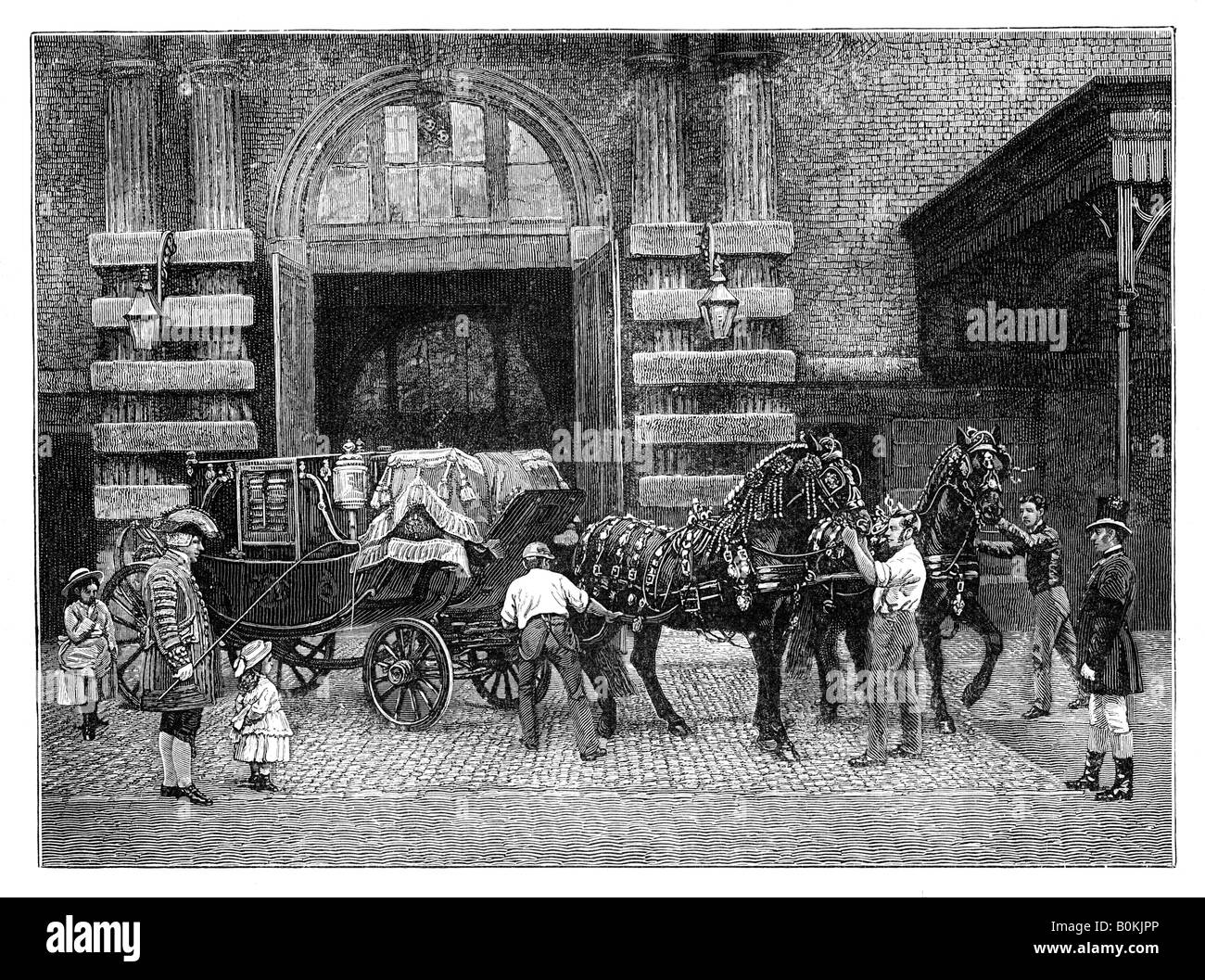 Harnessing the black horses at the Royal Mews, Buckingham Palace ...