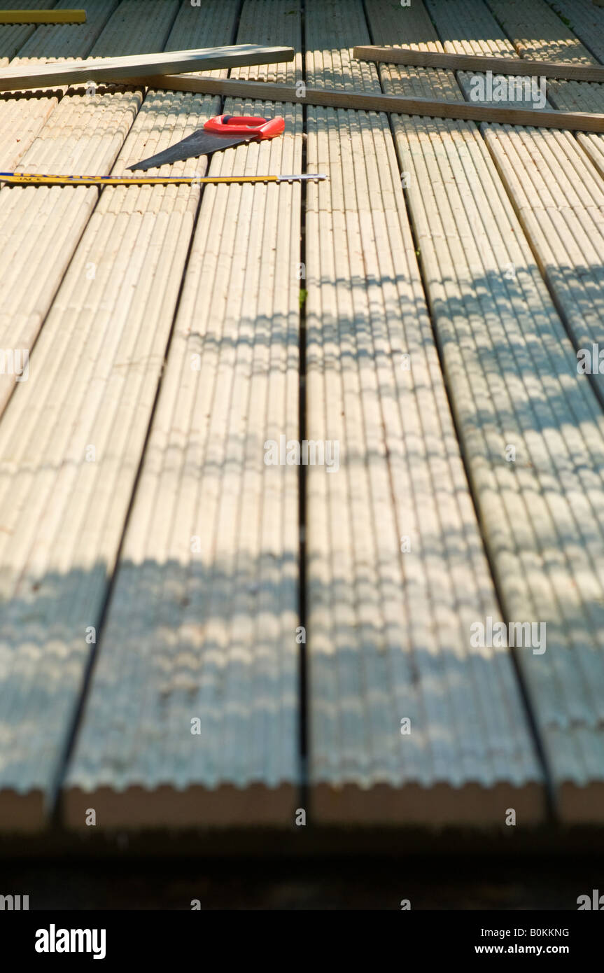 A decking construction, portrait photograph. View from the rear behind ...