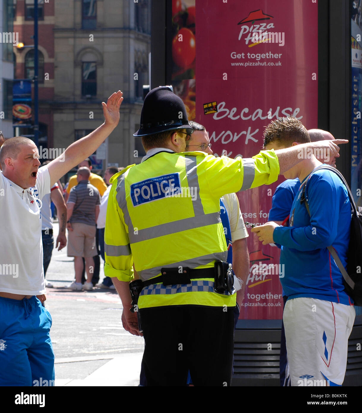 Policeman giving directions hi-res stock photography and images - Alamy