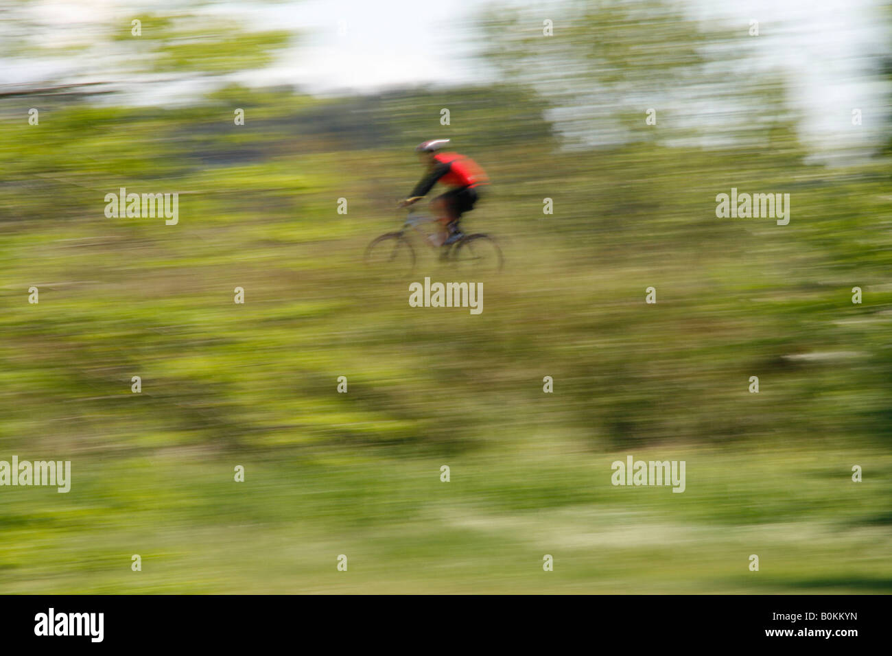 Red sky morning cyclist hi-res stock photography and images - Alamy