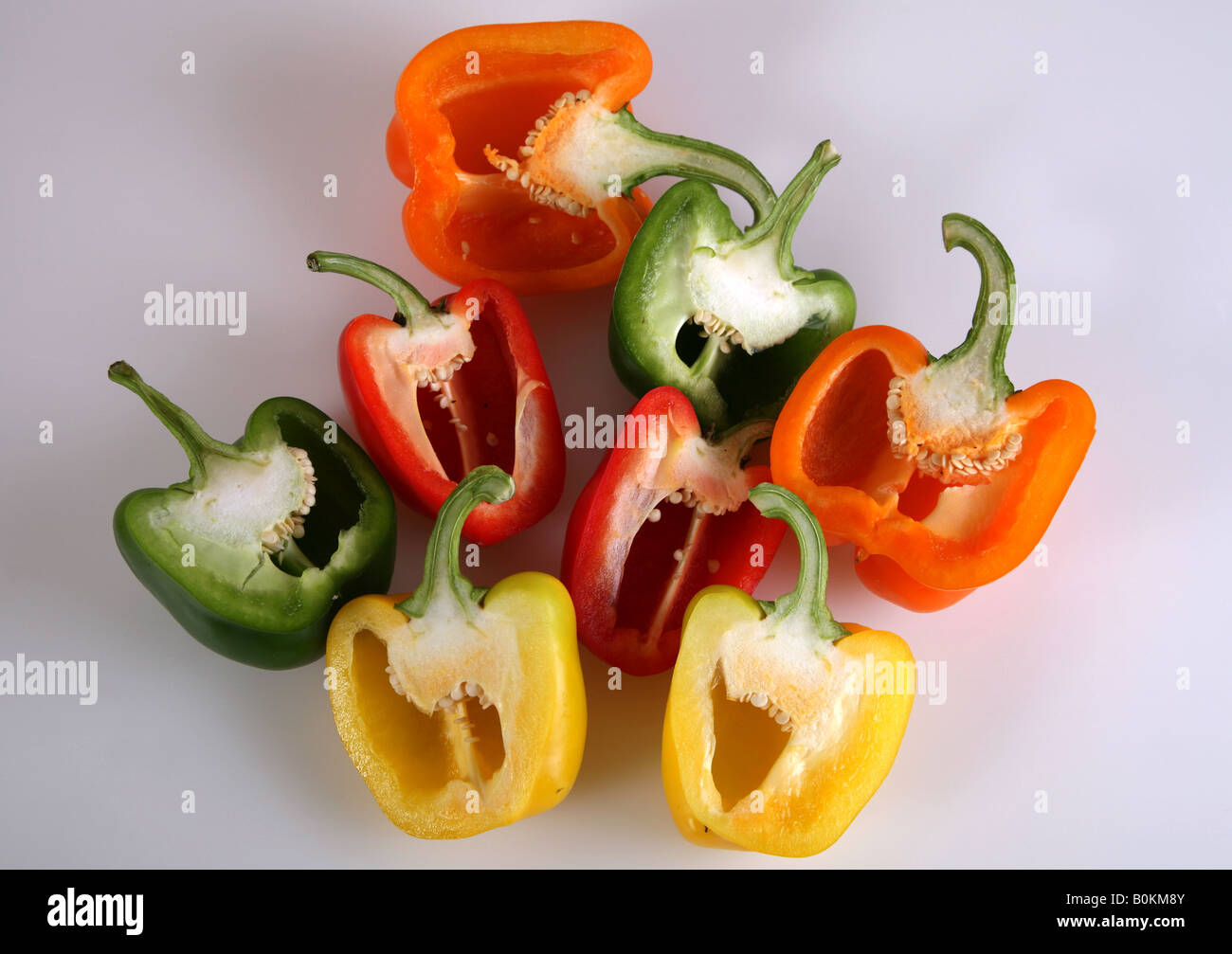 Coloured Bell Peppers Sliced in half Stock Photo - Alamy