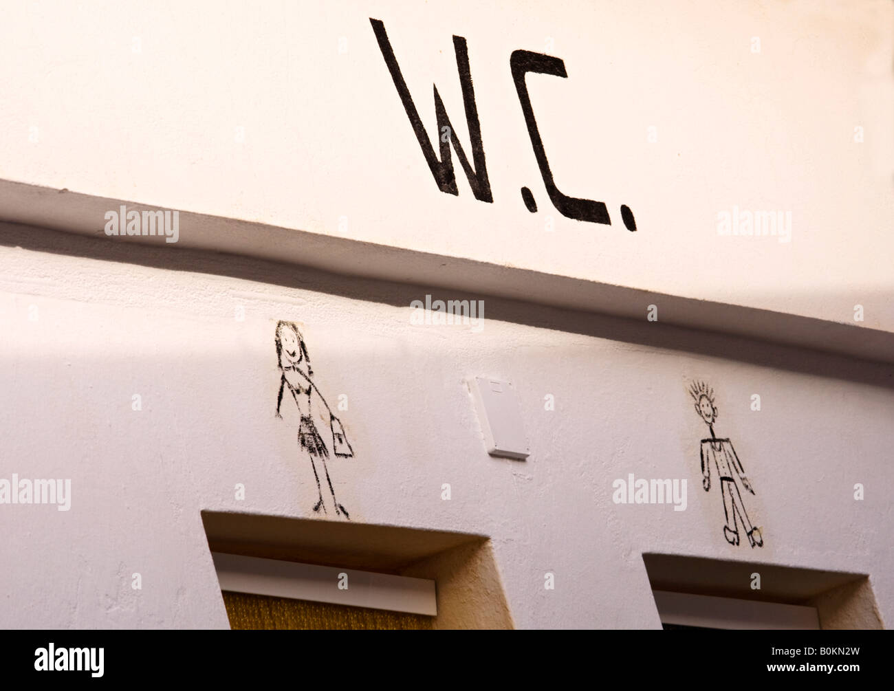 Toilet sign on wall,Portugal,Europe Stock Photo - Alamy