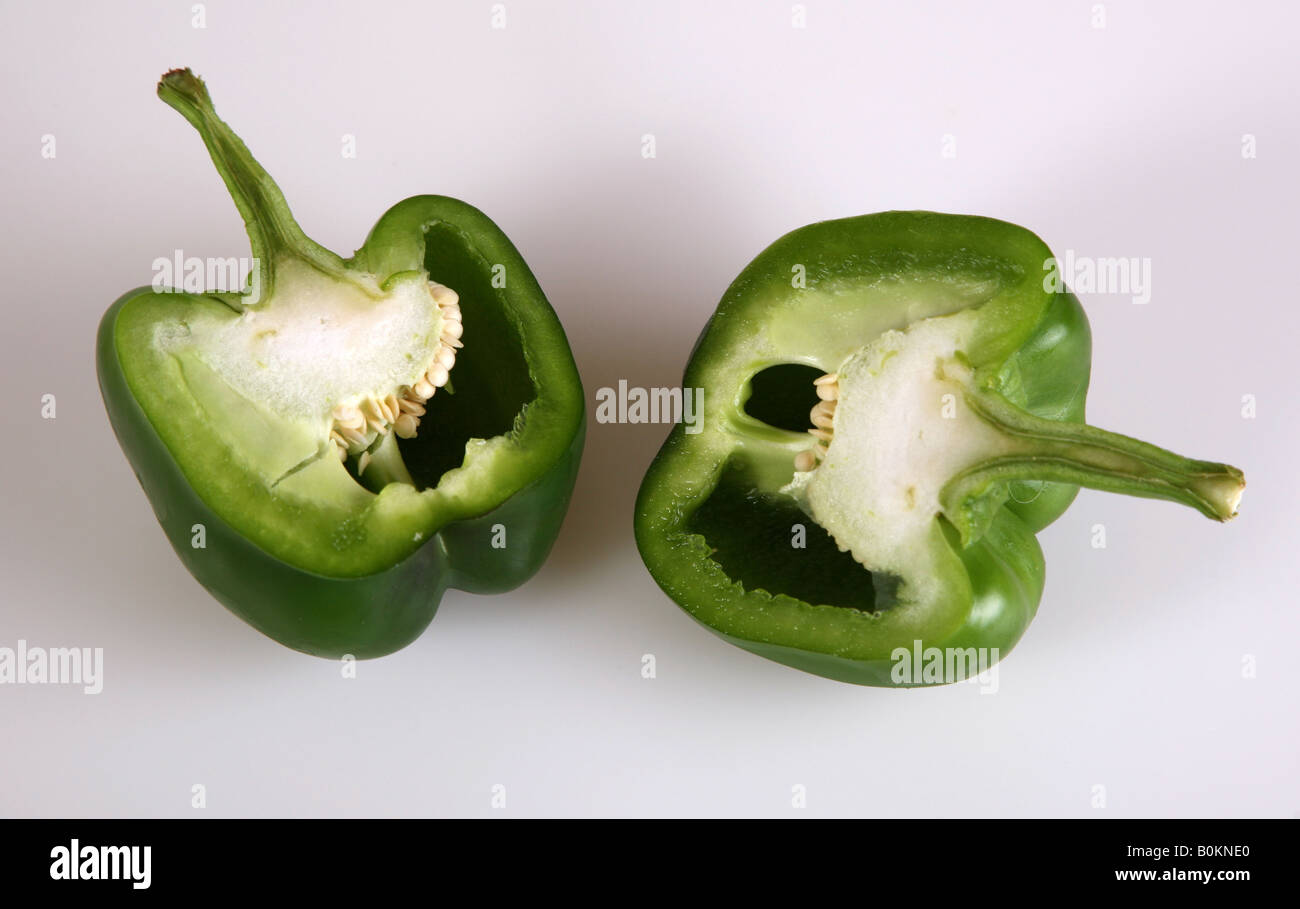 Green Bell Pepper Sliced in half Stock Photo - Alamy