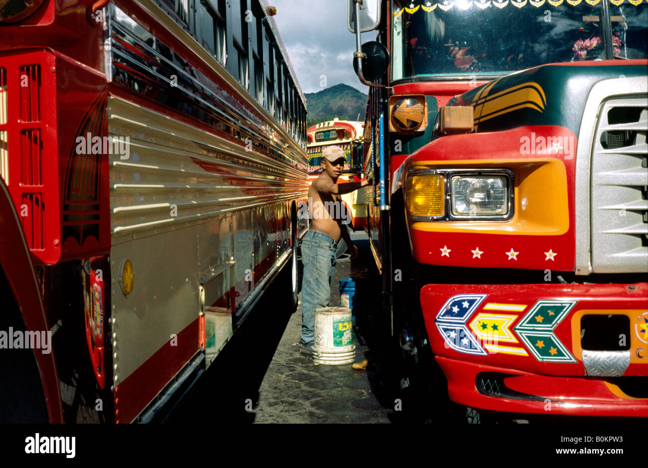 Feb 4, 2002 - Young driver giving his chicken bus a rinse at the bus ...