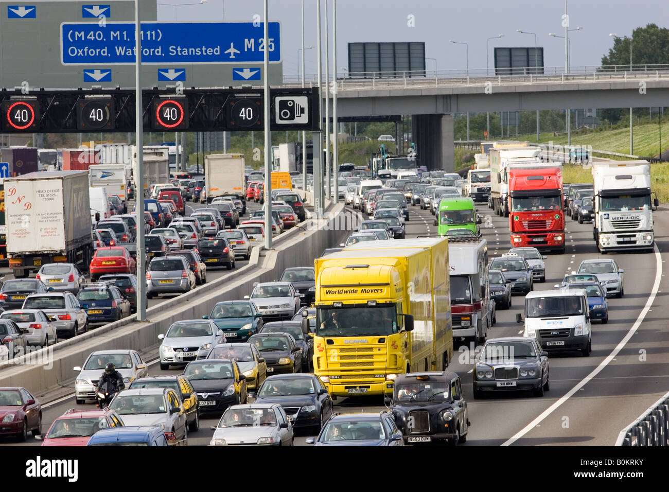 Traffic congestion of cars and trucks at a standstill in both ...