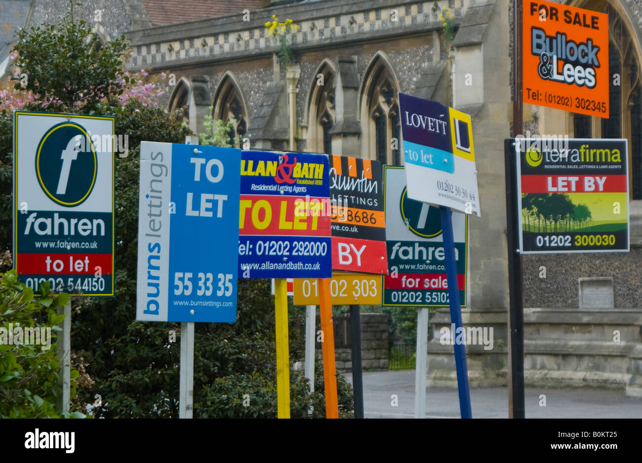 Estate agent for sale to let signs Stock Photo - Alamy