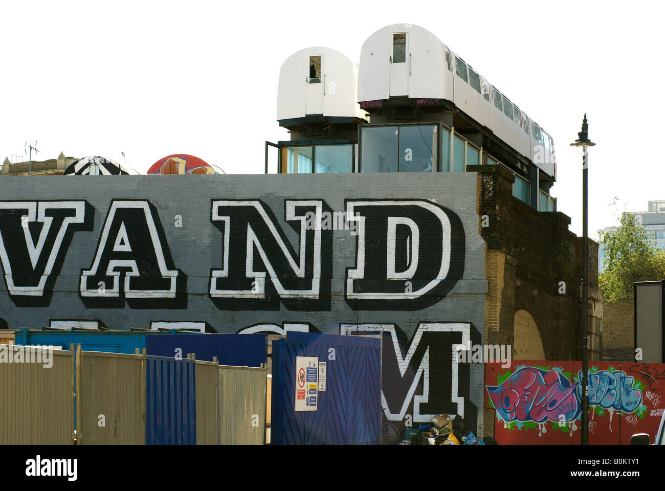 Recycled tube carriages,used as artists studios,on top of abandoned ...