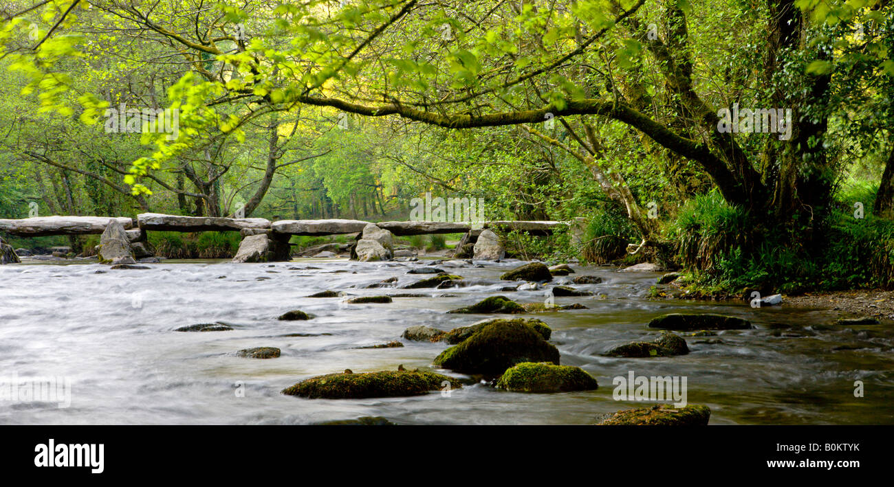 The ancient clapper bridge Tarr Steps crossing the River Barle in ...