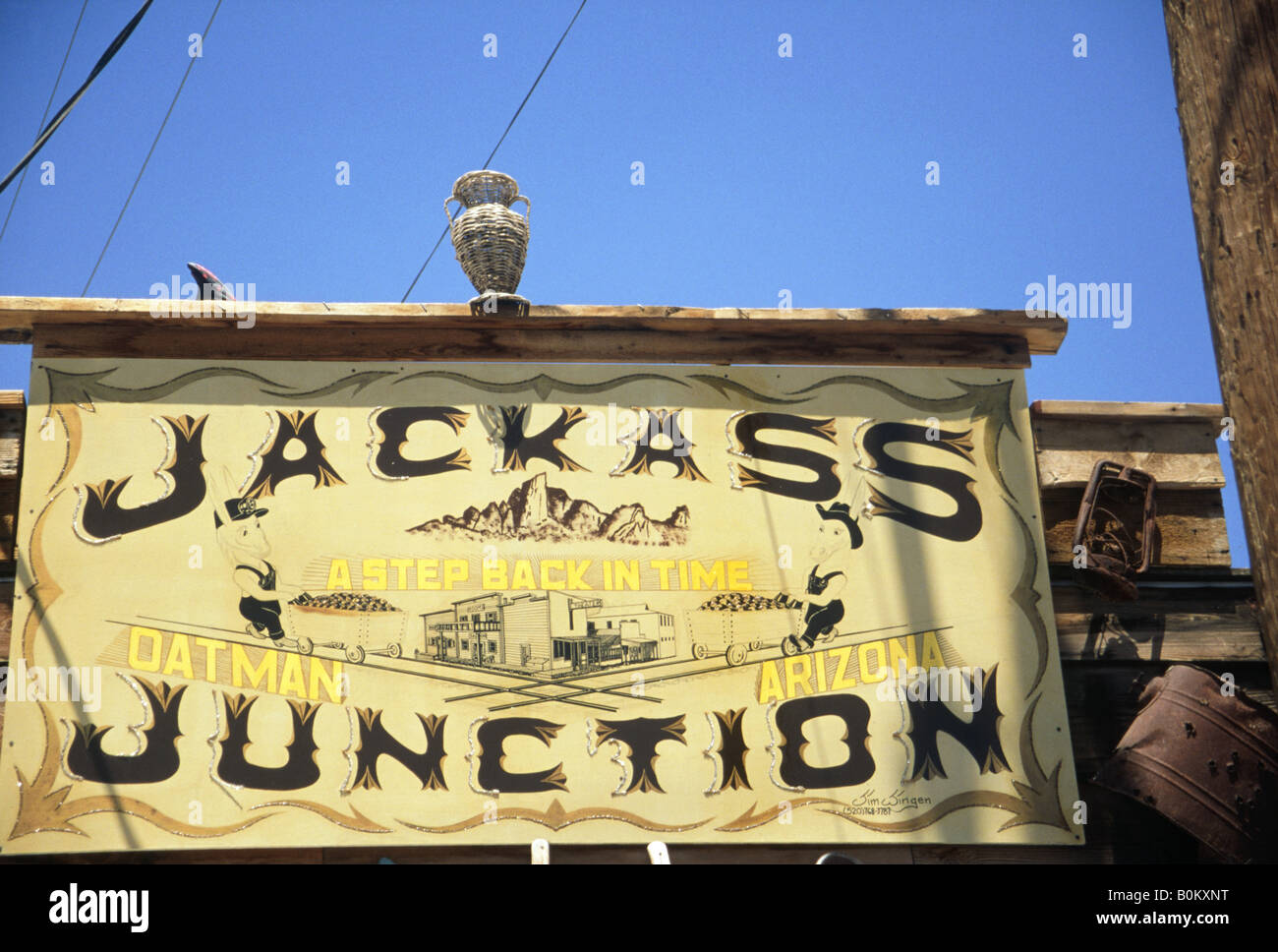 Jackass Junction. Road sign. Historic town. Slogan Step back in time ...