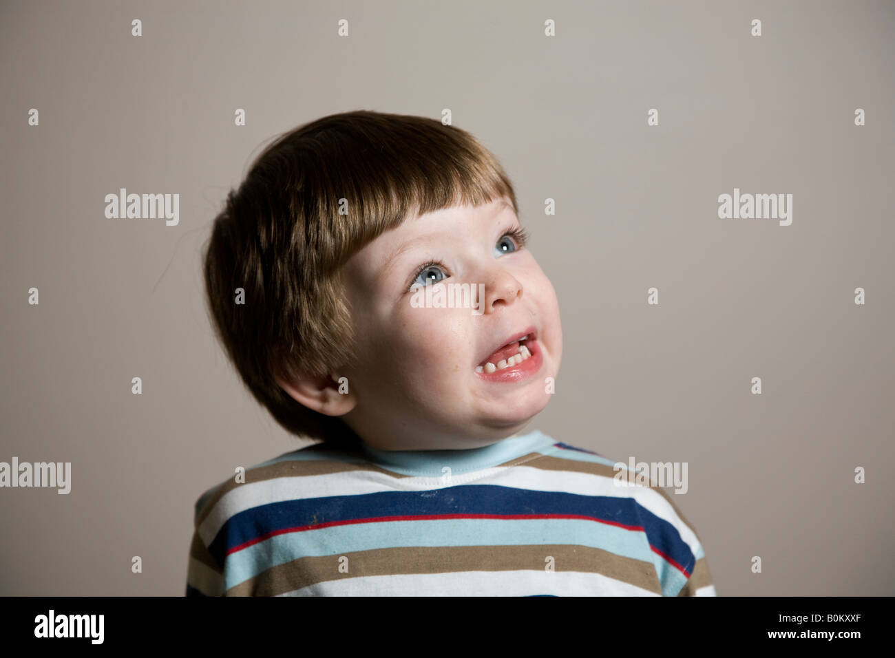 Happy face A young boys makes a happy face expression Stock Photo - Alamy