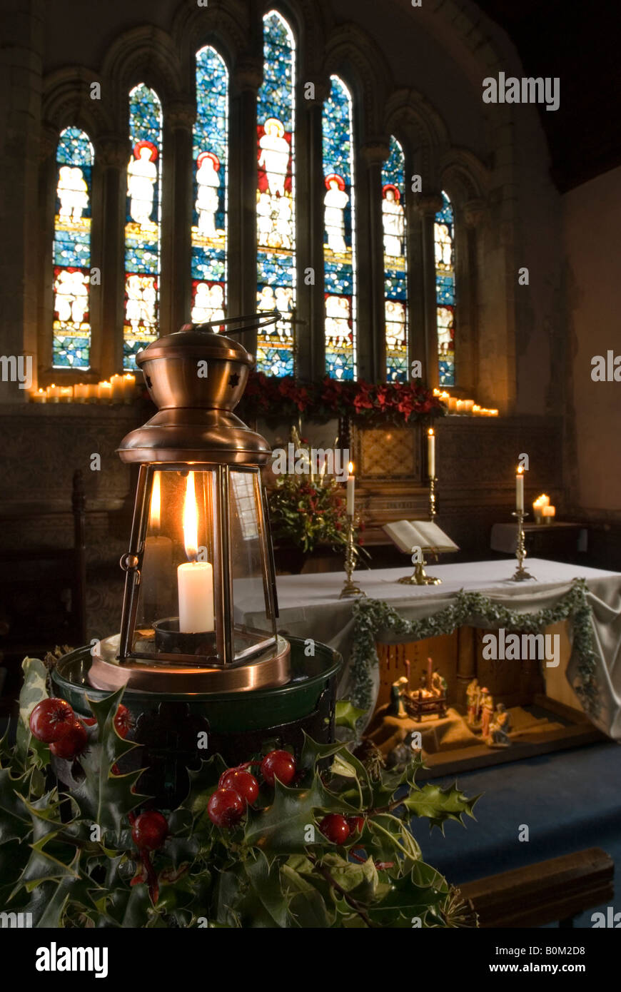 The altar and seven lancet window at All Saints Church, Ockham, England ...