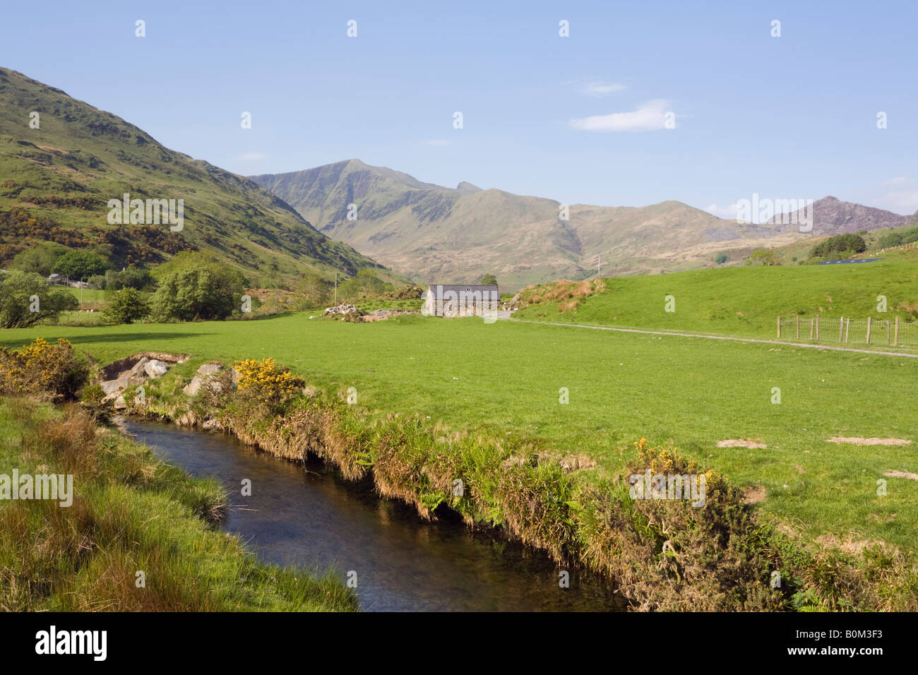Afon Dwyfor river in rural Welsh valley with mountains in Cwm Pennant ...