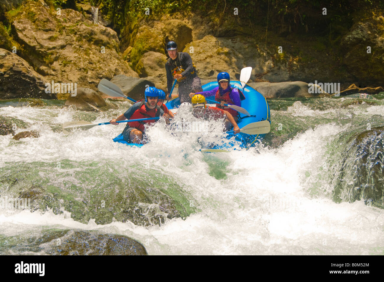COSTA RICA Group whitewater rafting on the Lower Pacuare River ...