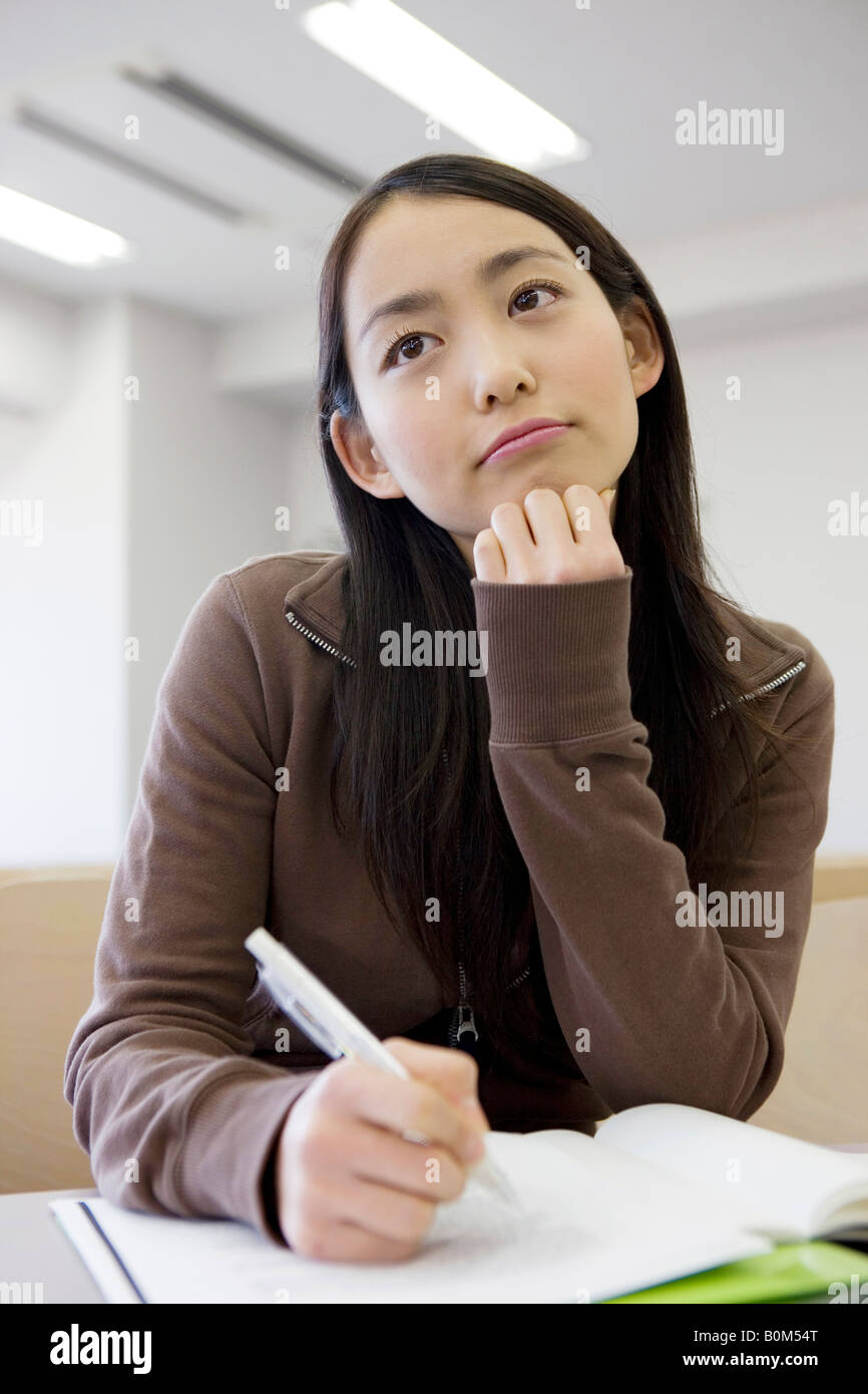 Japanese female student studying in a classroom Stock Photo - Alamy