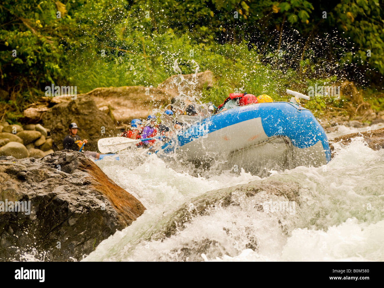 COSTA RICA Group whitewater rafting on the Lower Pacuare River ...