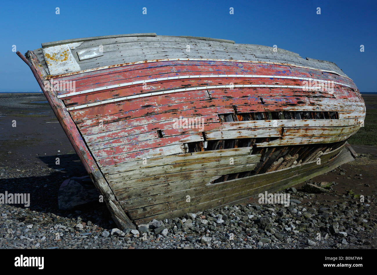 Beached wreck of a wooden boat . Rampside , Morecambe Bay , Cumbria ...