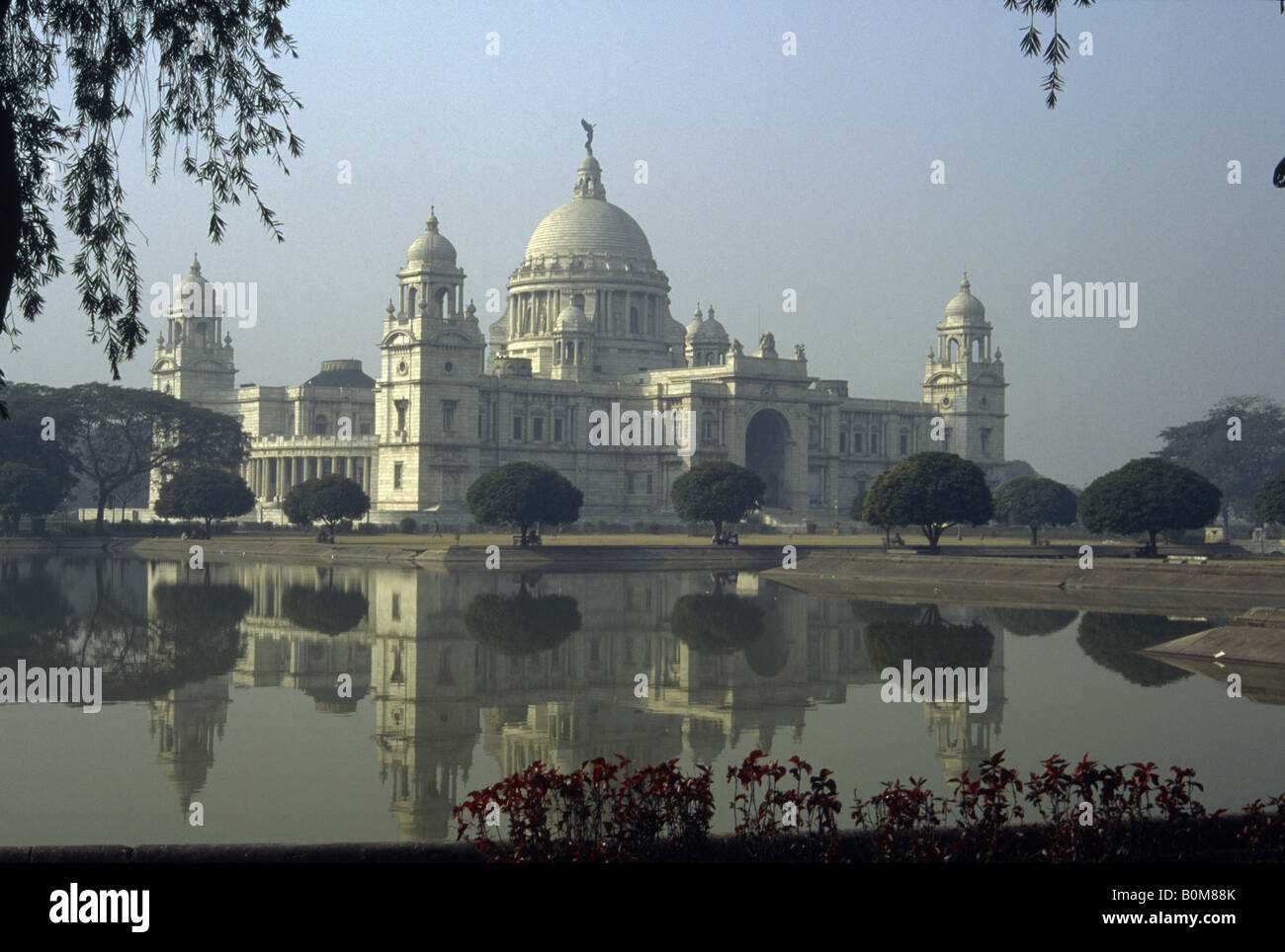 Victoria Memorial. Large white marble building. Dome. Four corner ...