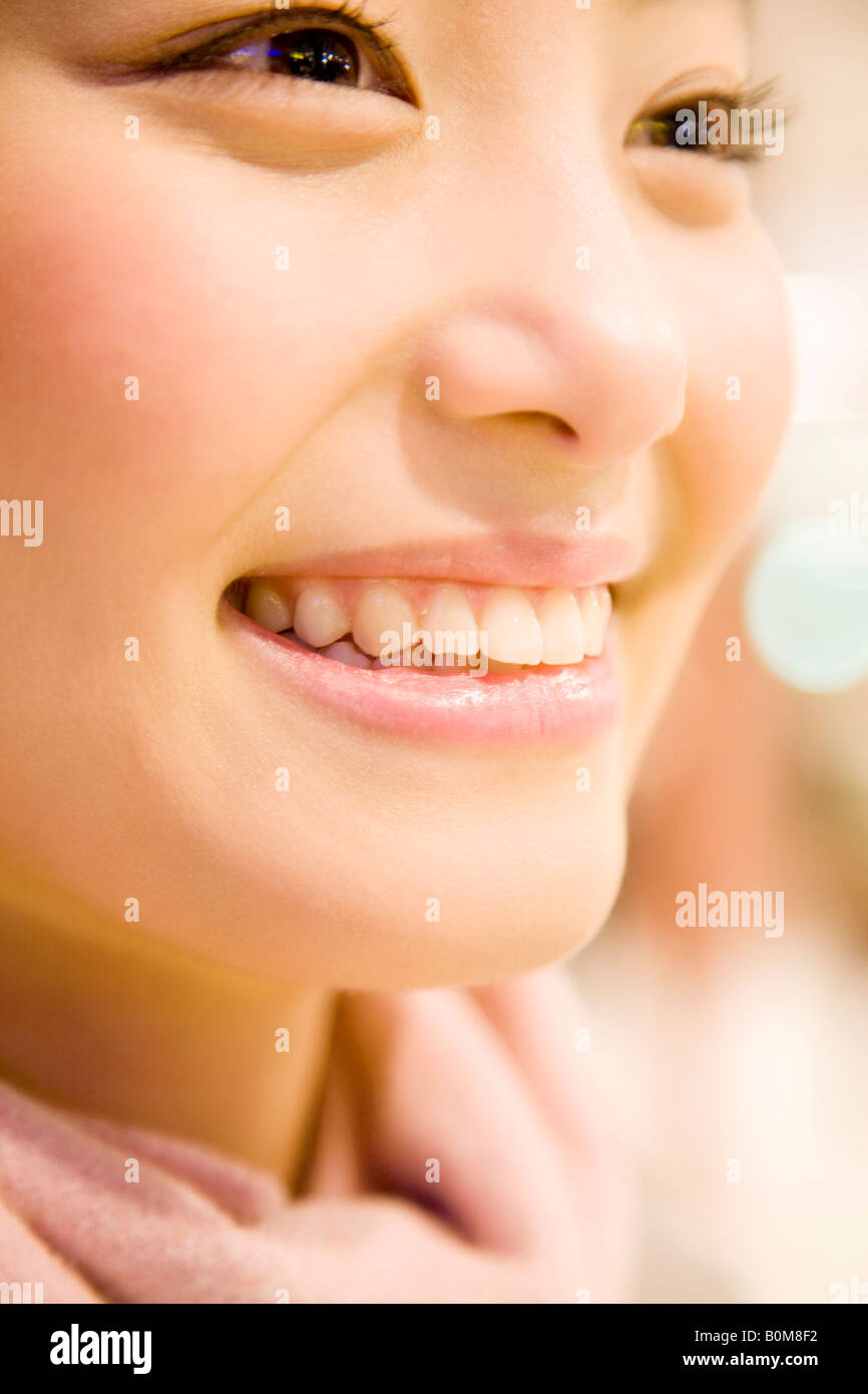 Smiling Japanese woman Stock Photo - Alamy