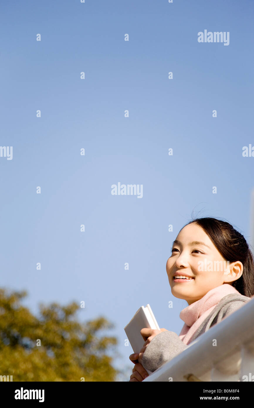 Japanese woman below the blue sky Stock Photo - Alamy